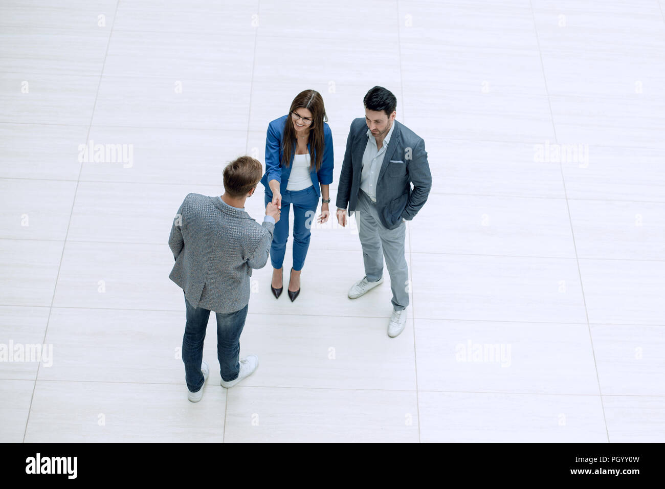 top view.employees shaking hands Stock Photo - Alamy