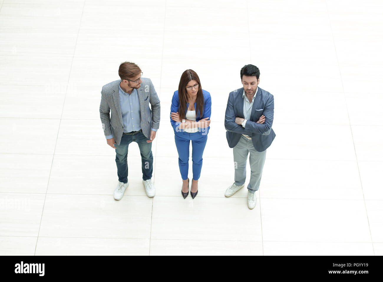 top view.confident young people standing together Stock Photo - Alamy
