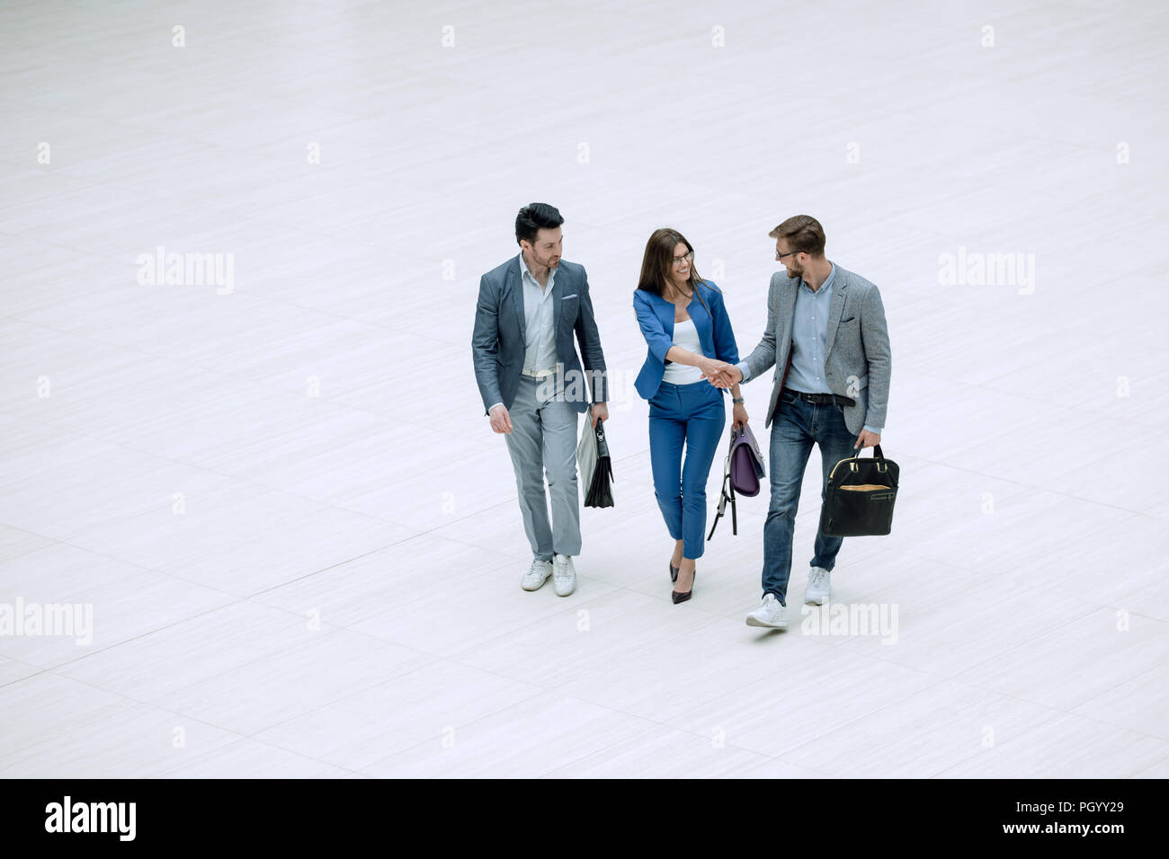 Woman handshake walking hi-res stock photography and images - Alamy