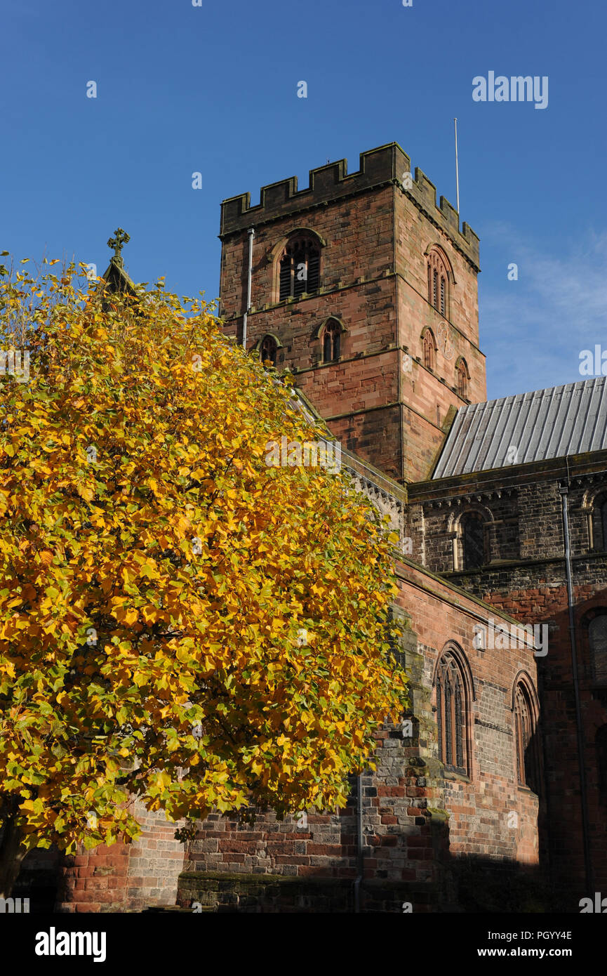 West side of Carlisle Cathedral, Cumbria, England, UK on a sunny autumn ...