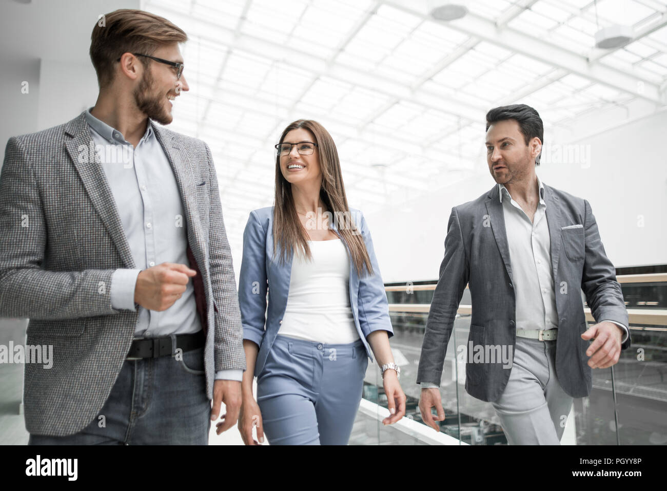 group of managers talking in the business cente Stock Photo - Alamy