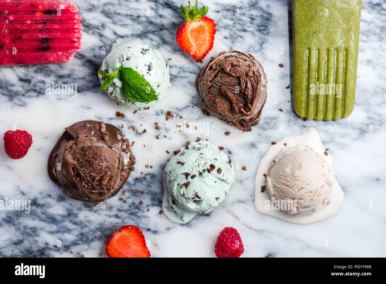 Selection of different ice cream scoops such as mint, chocolate and ...
