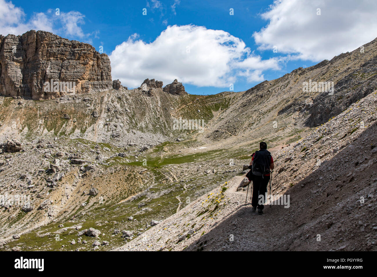 Mountain hiker in the Puez-Geisler Nature Park, Dolomites, South Tyrol ...