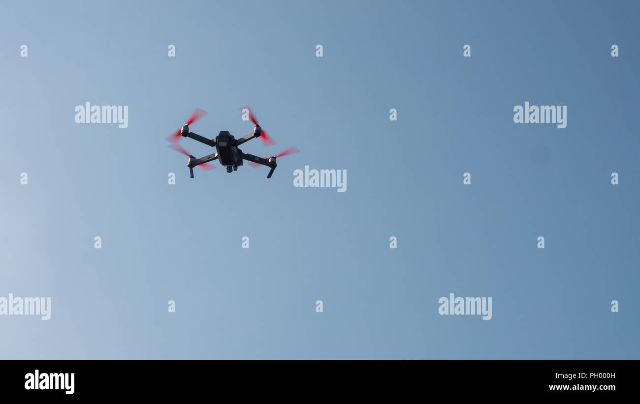 Flying in a clear blue sky hi-res stock photography and images - Alamy