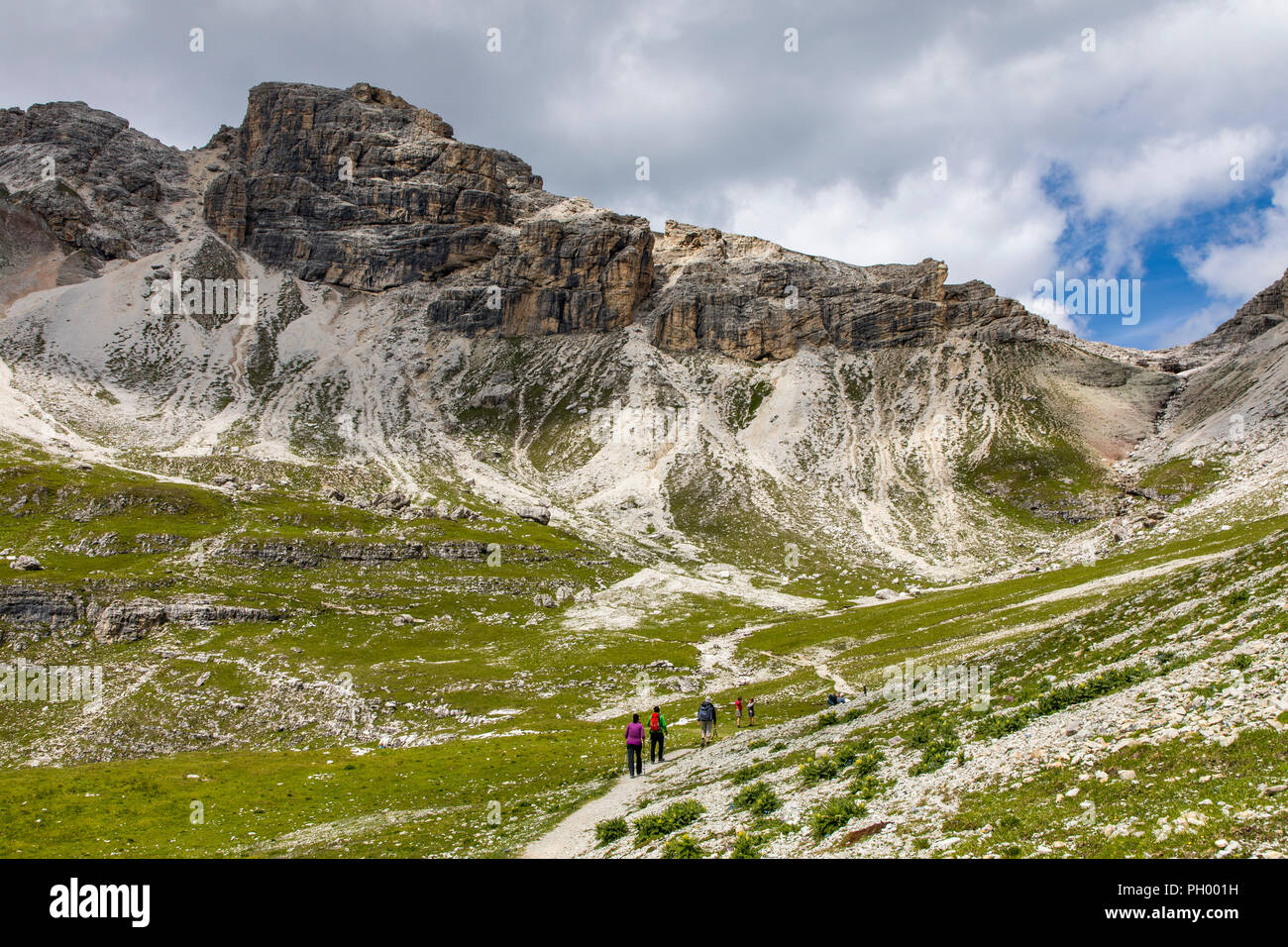 Mountain hiker in the Puez-Geisler Nature Park, Dolomites, South Tyrol ...