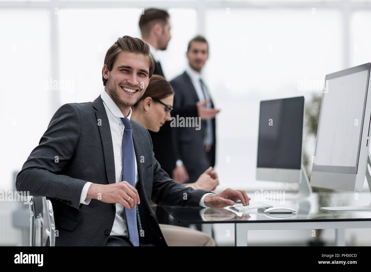 employees of the company work in the office Stock Photo - Alamy