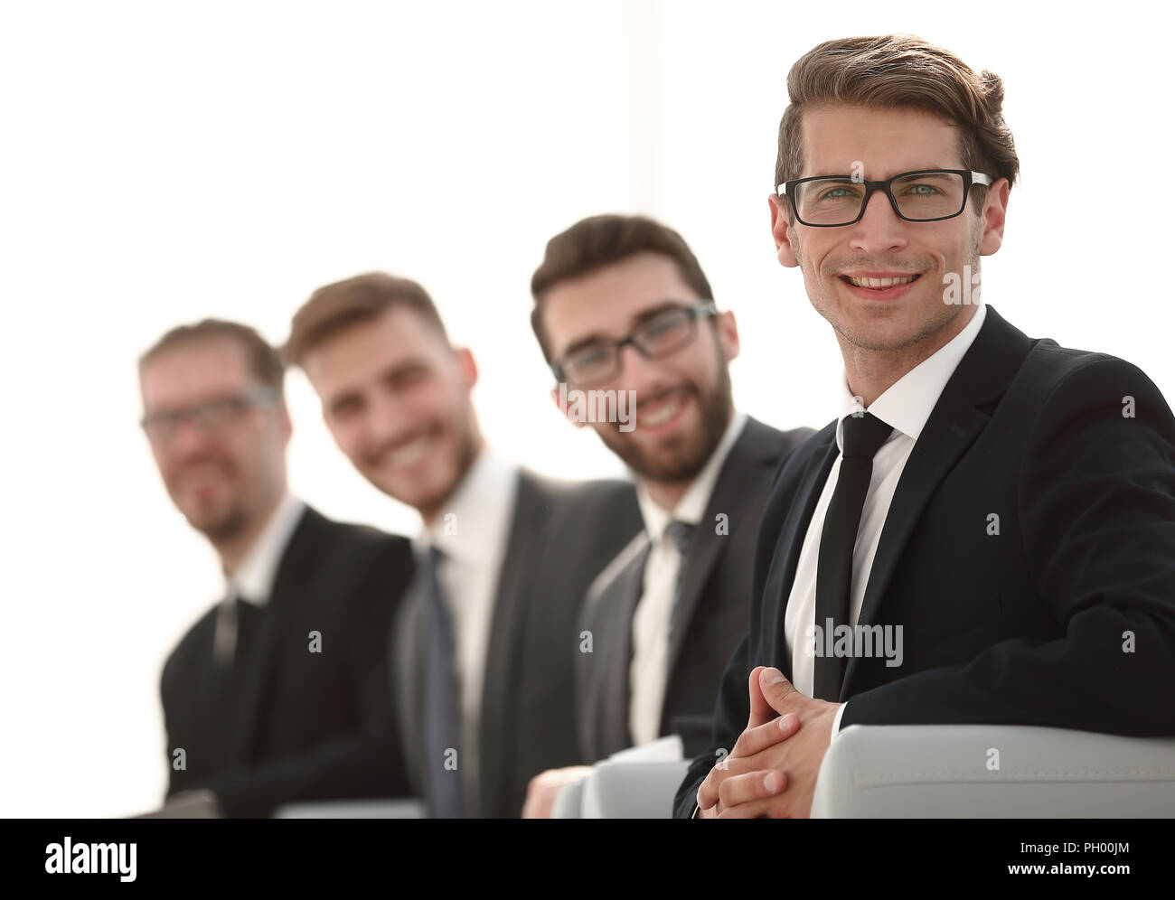 close up.a group of business people sitting in the conference room ...