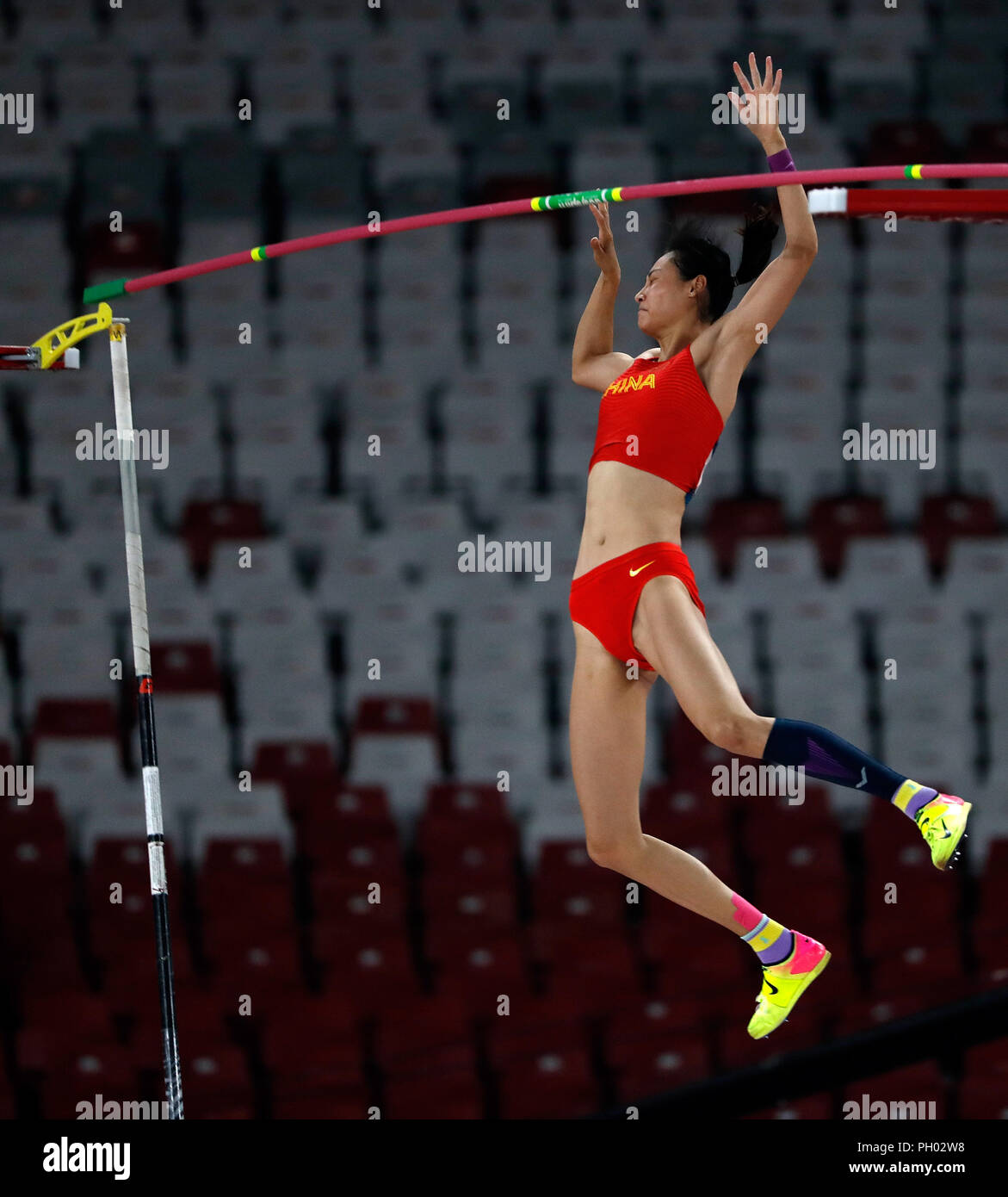 Jakarta. 28th Aug, 2018. Li Ling of China competes during women's pole ...