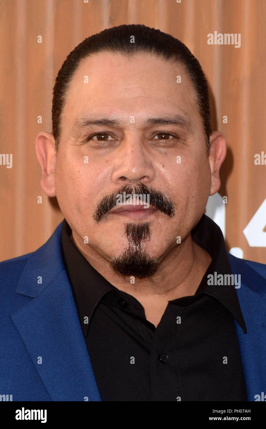 Hollywood, Ca. 28th Aug, 2018. Emilio Rivera at the Mayans M.C. red ...