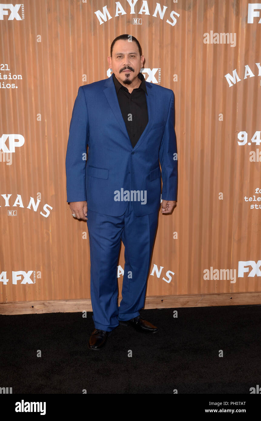 Hollywood, Ca. 28th Aug, 2018. Emilio Rivera at the Mayans M.C. red ...