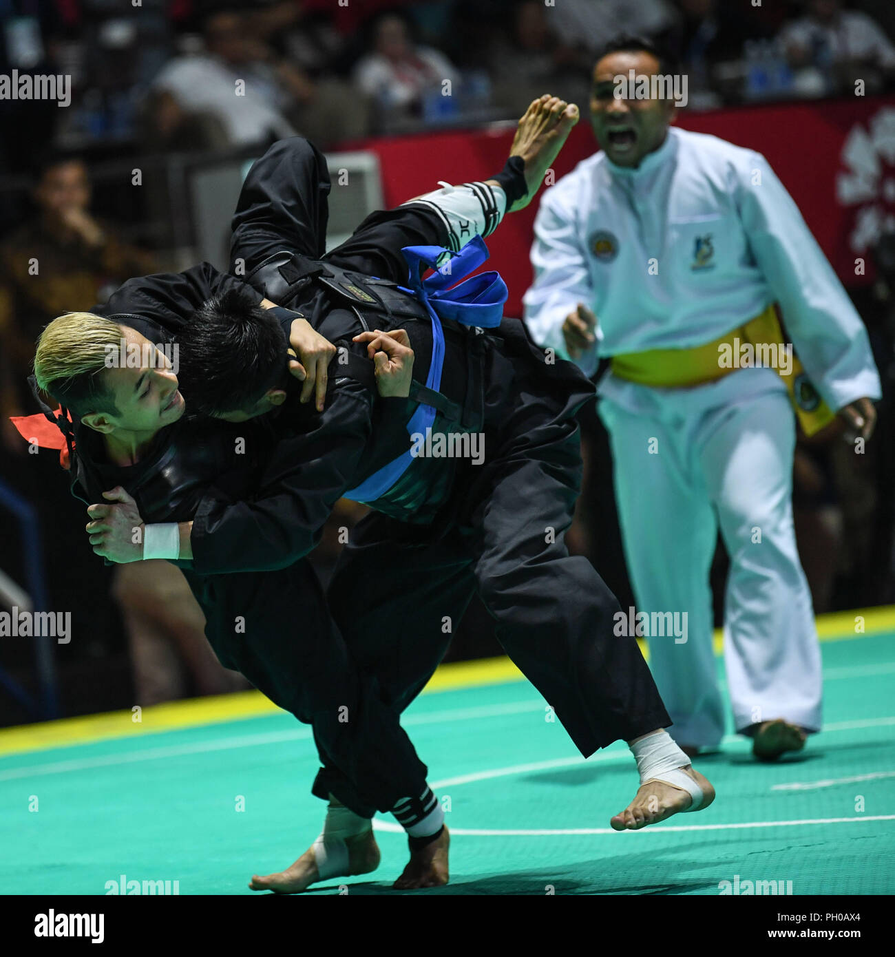 Jakarta, Indonesia. 29th Aug, 2018. Hanifan Yudani Kusumah (L) of ...