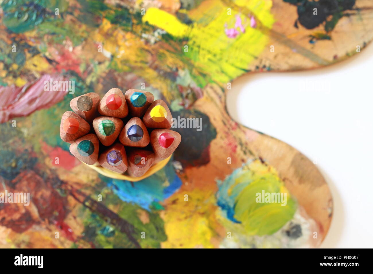 Tools for creativity, namely pencils, palette and brushes Stock Photo ...