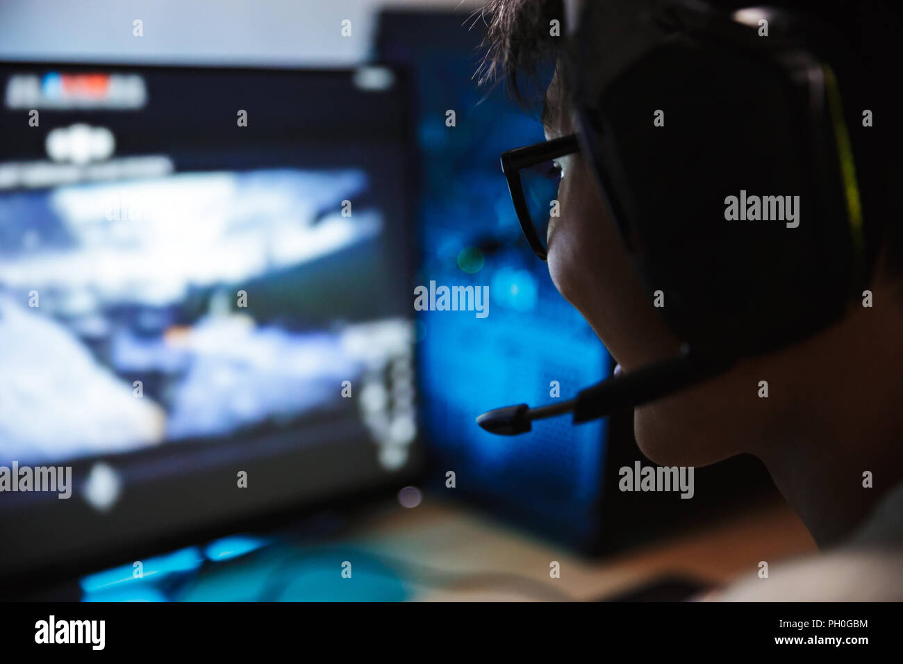 Photo closeup of obsessed gamer boy playing video games online on ...