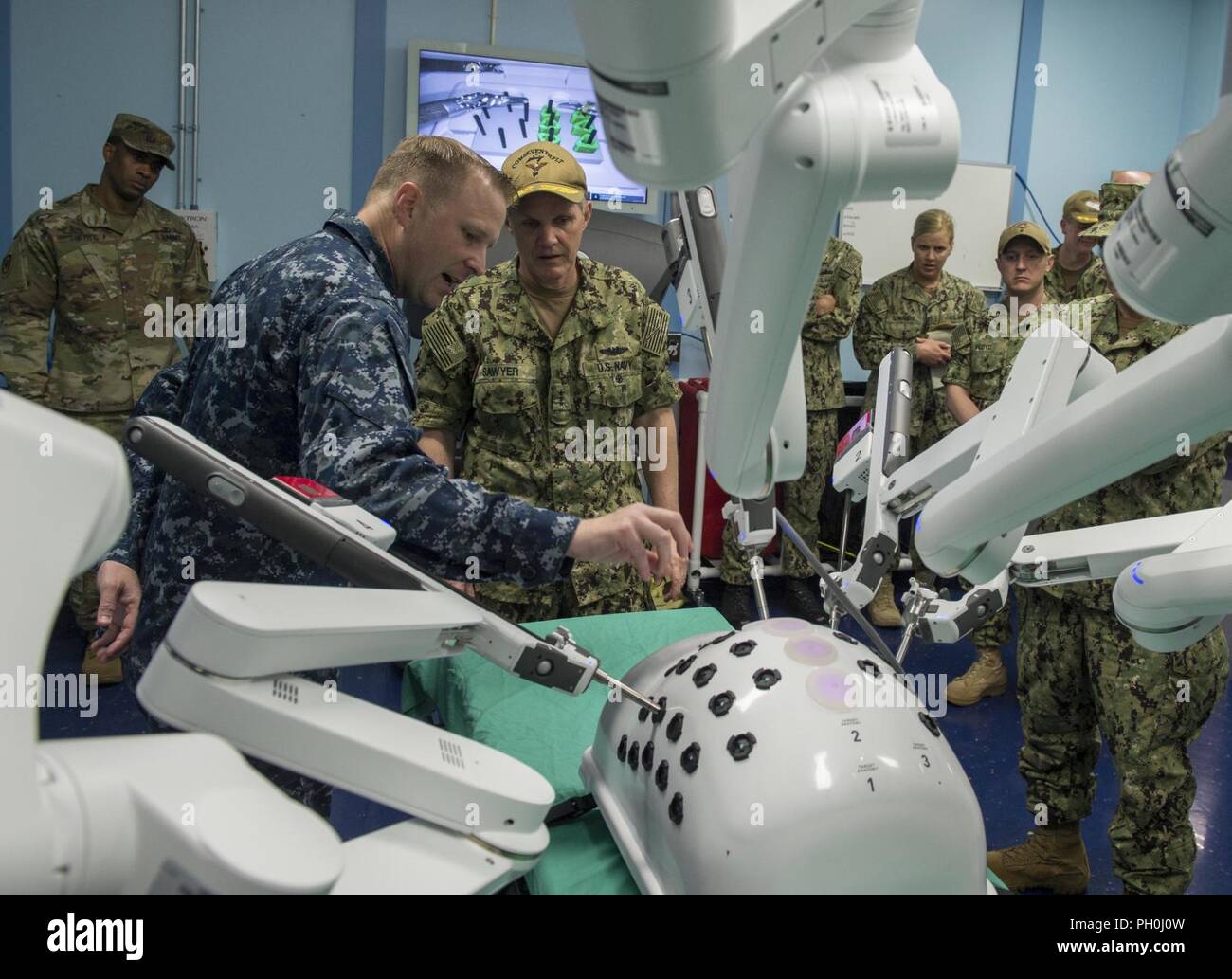 Japan (June 14, 2018) Vice Adm. Phillip Sawyer (center), commander, U.S. 7th Fleet, views the Da ...