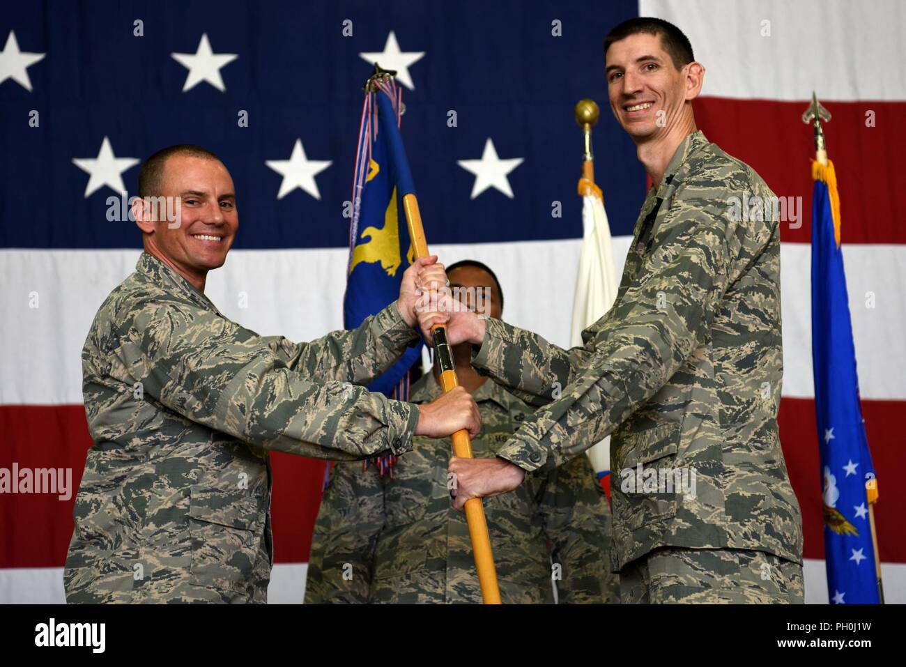 U.S. Air Force Lt. Col. Peter Moughan receives the 51st Operations ...