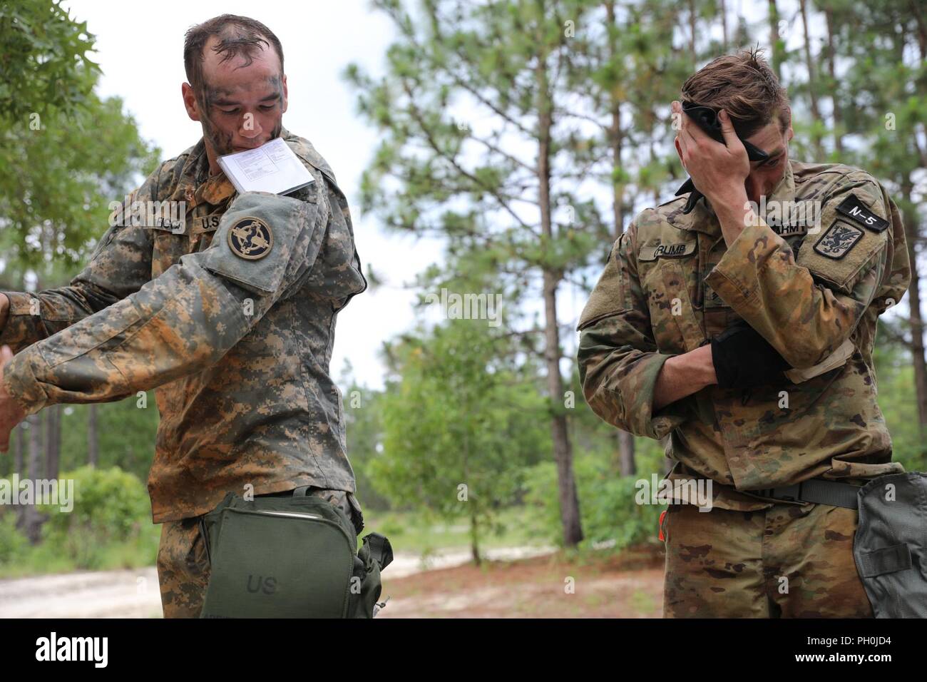 U.S. Army Reserve Sgt. Thomas Crump, right, a chemical, biological ...