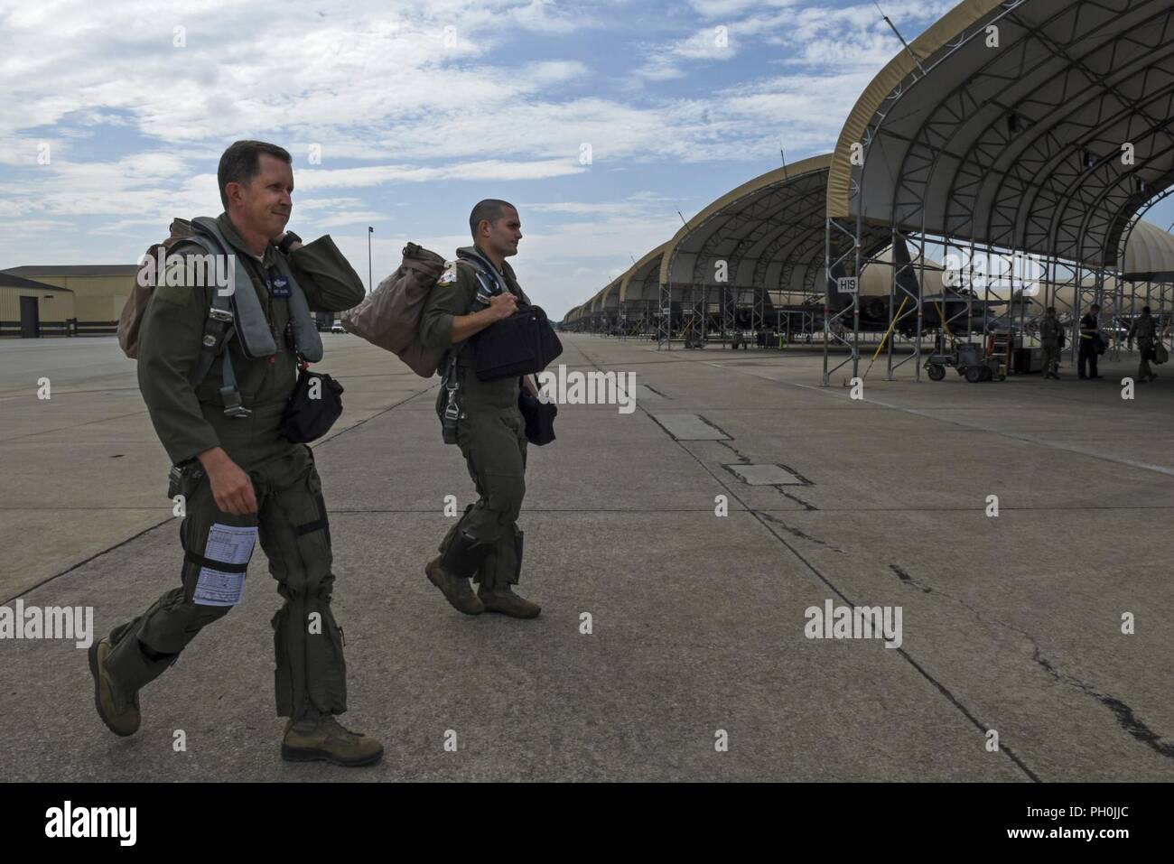 Col. Christopher Sage (left), 4th Fighter Wing commander, and 1st Lt ...