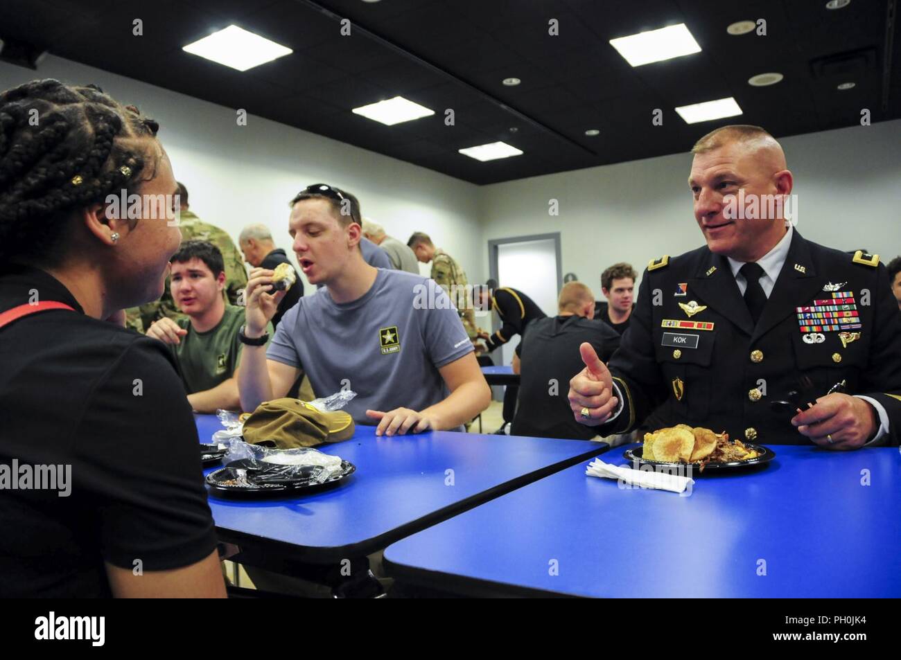 Maj. Gen. Troy Kok, the 99th Readiness Division commander, eats lunch ...