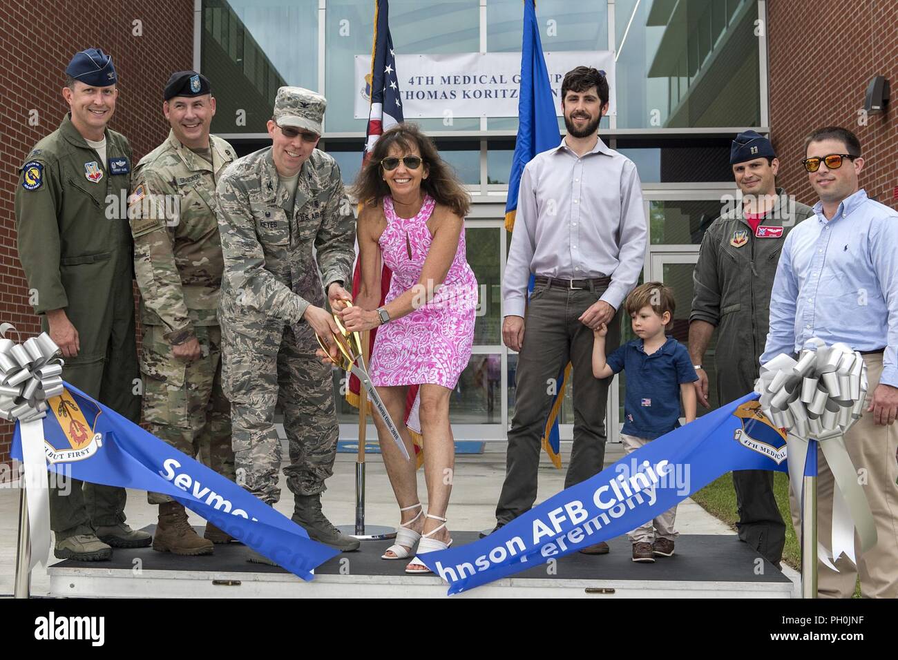 Col. Craig Keyes, 4th Medical Group commander, and Julianne Kortiz ...