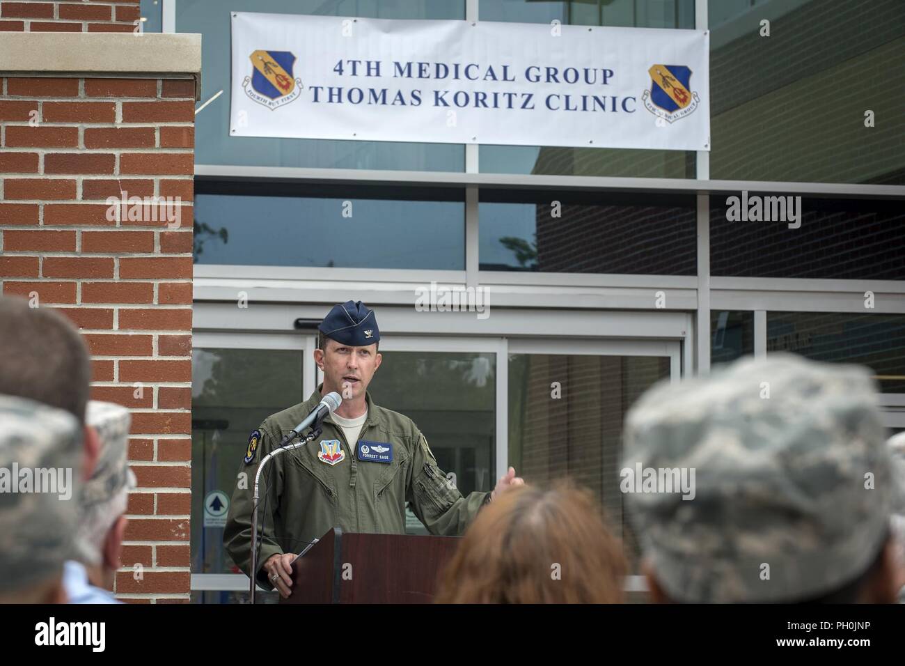 Col. Christopher Sage, 4th Fighter Wing commander, speaks at the ribbon ...