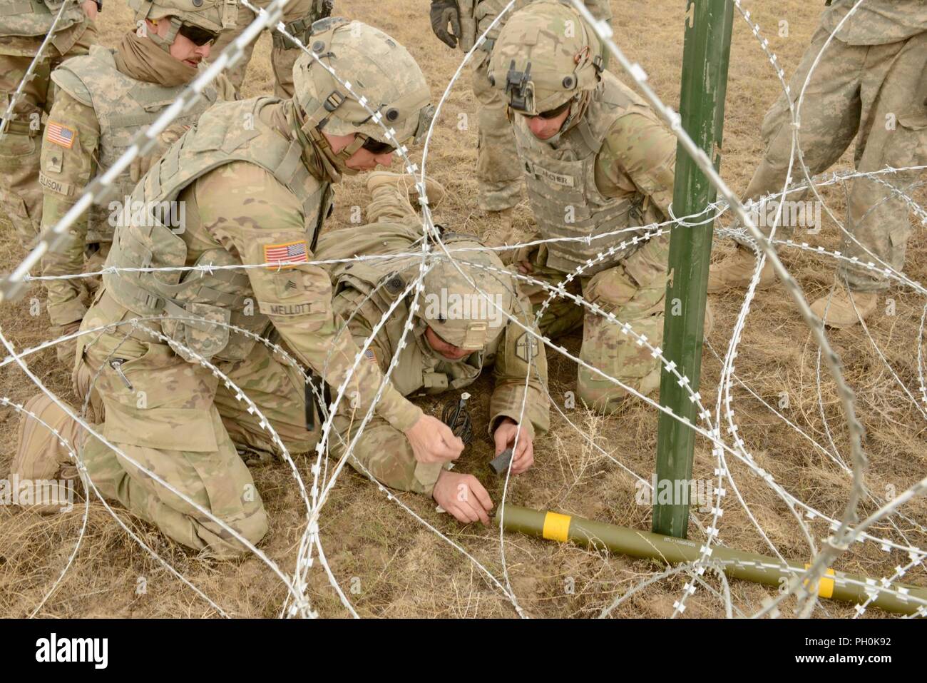 Pfc. Andrew Taylor of Army Reserve’s 321st Engineer Battalion primes a ...