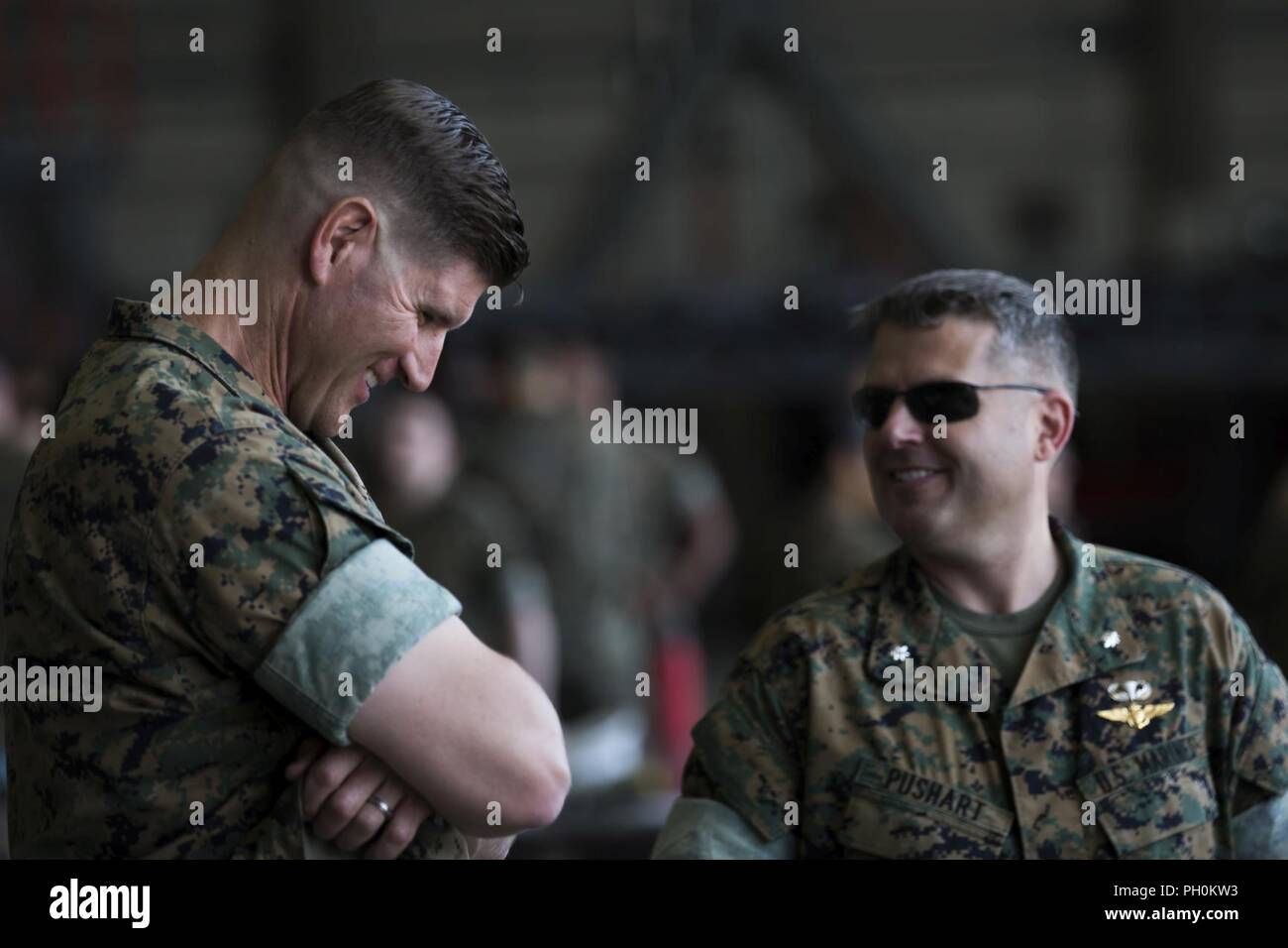 U.S. Marine Corps Lt. Col. Mitchell T. Maury, left, commanding officer ...