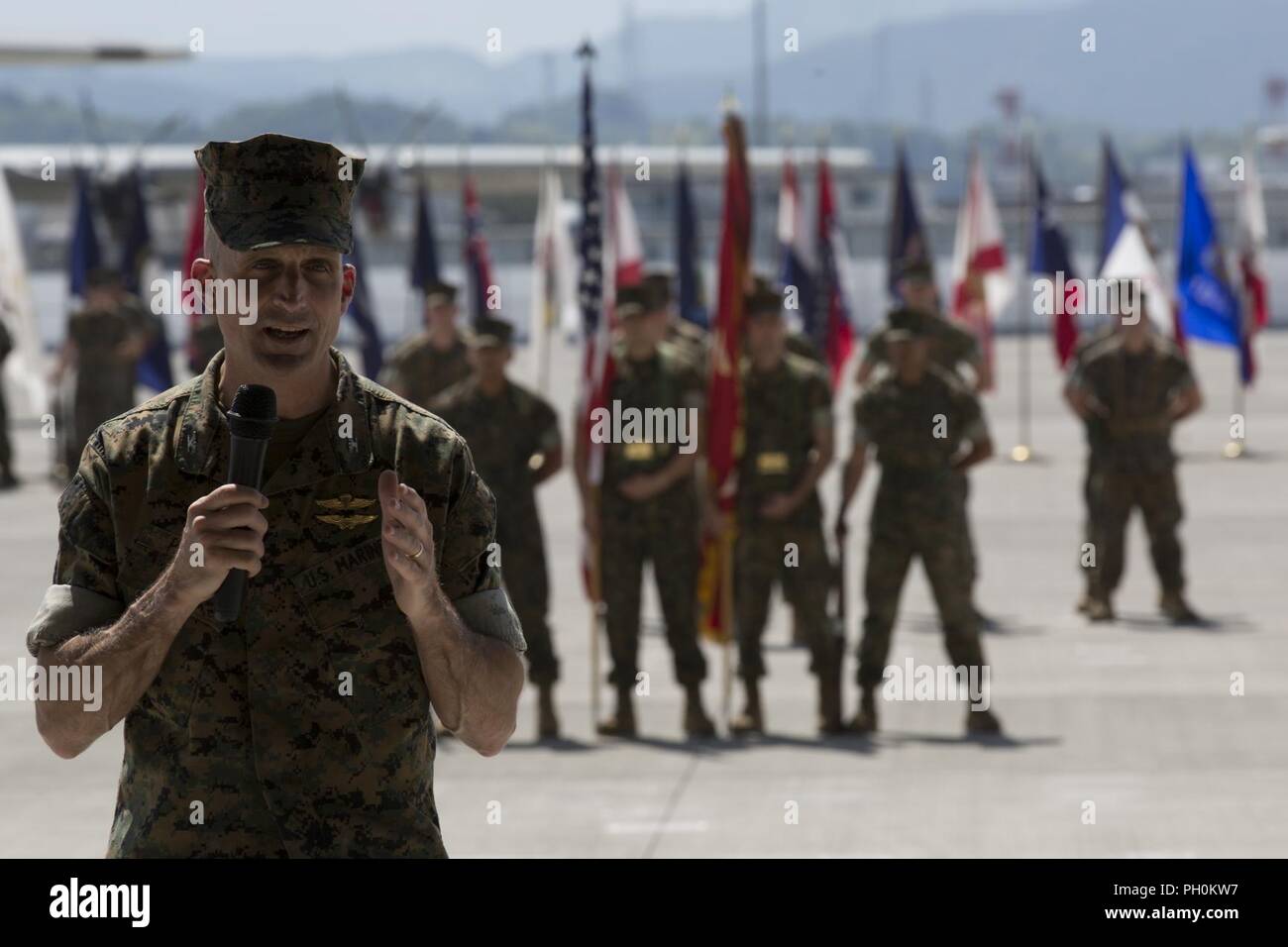 U.S. Marine Corps Col. Mark Palmer, left, commanding officer of Marine ...
