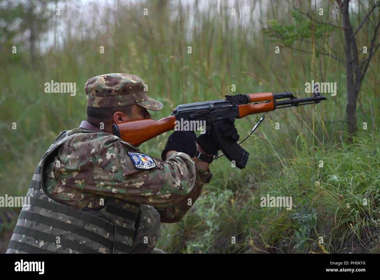 A soldier from the Romanian Armed Forces practice proper techniques for ...