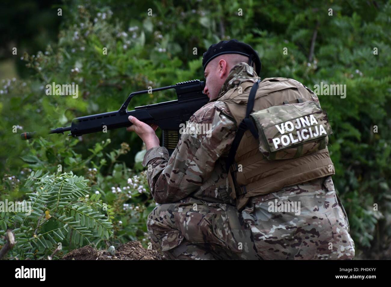 A soldier from the Armed Forces of Montenegro practice proper ...