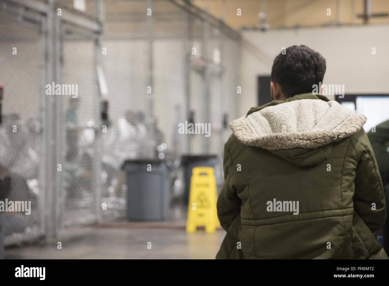 U.S. Border Patrol agents conduct intake of illegal border crossers at ...