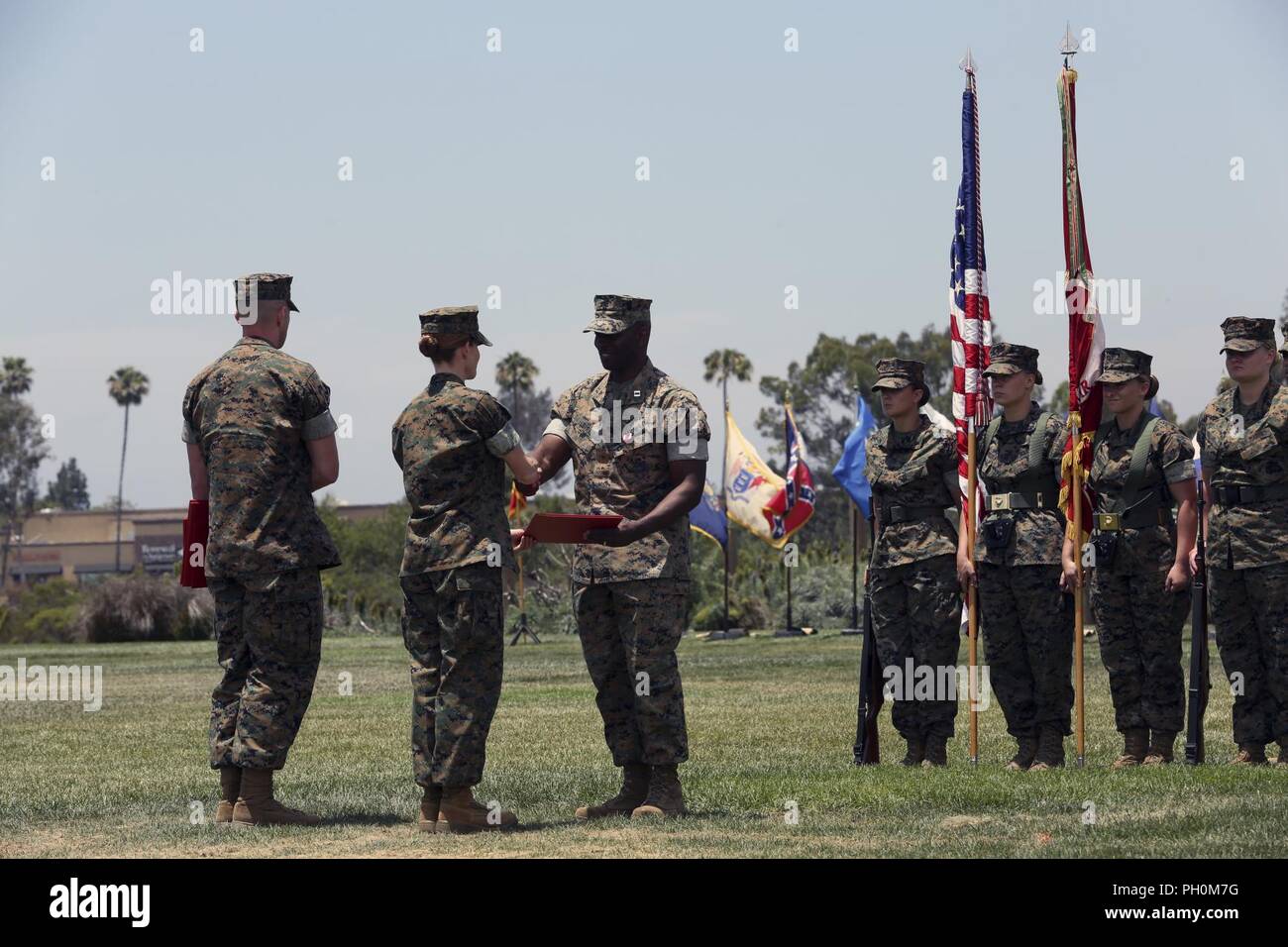 Maj. Jennifer Ledford presents Capt. James Leary, Marine Corps Air ...