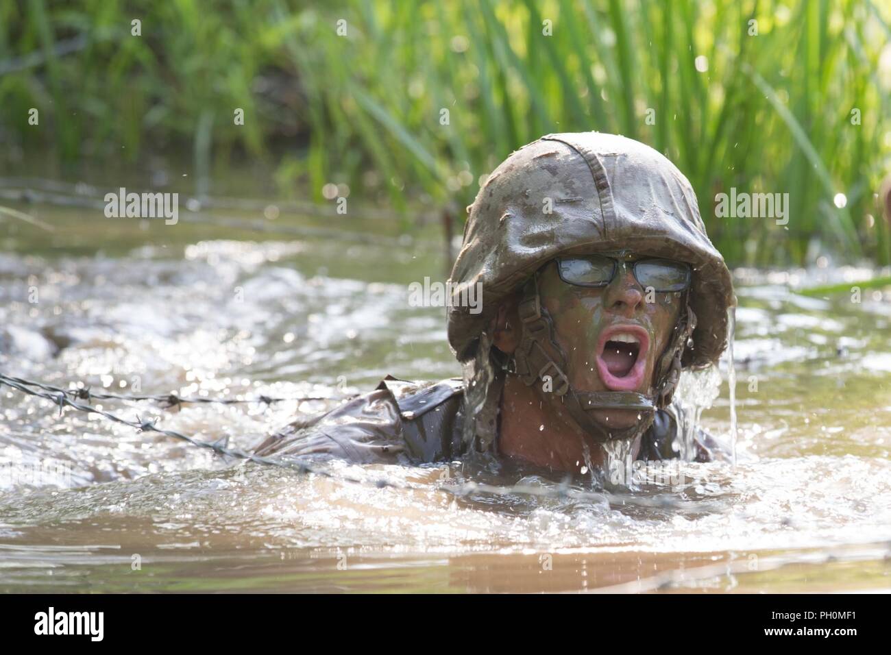 A candidate with the Officer Candidates School (OCS) takes a breath ...