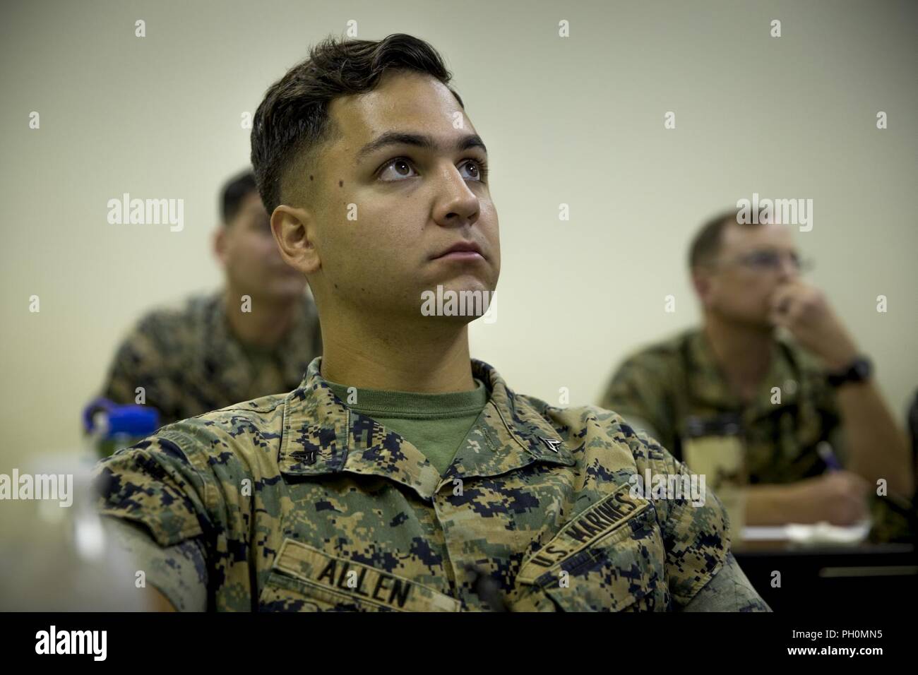 U.S. Marine Corps Cpl. Nicholas Allen, a chemical, biological ...
