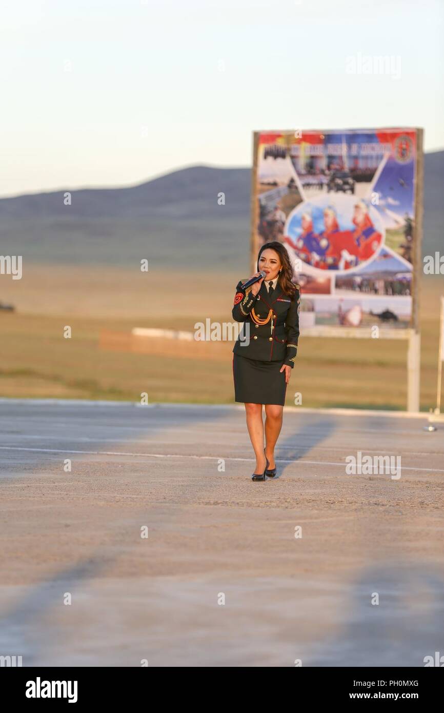 A Mongolian singer performs for service members participating in Khaan ...