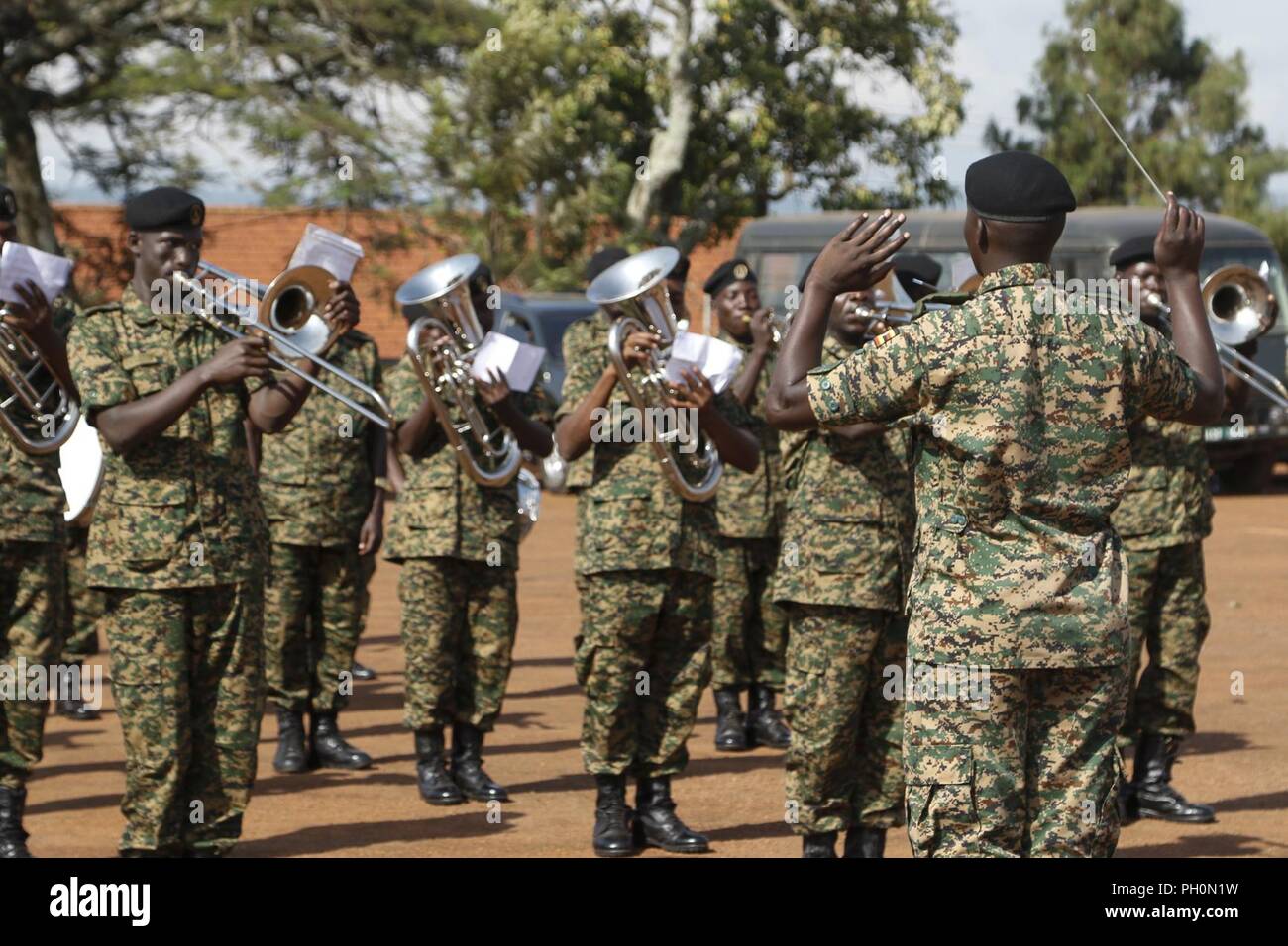 Uganda People’s Defence Force band plays the Ugandan National Anthem at ...