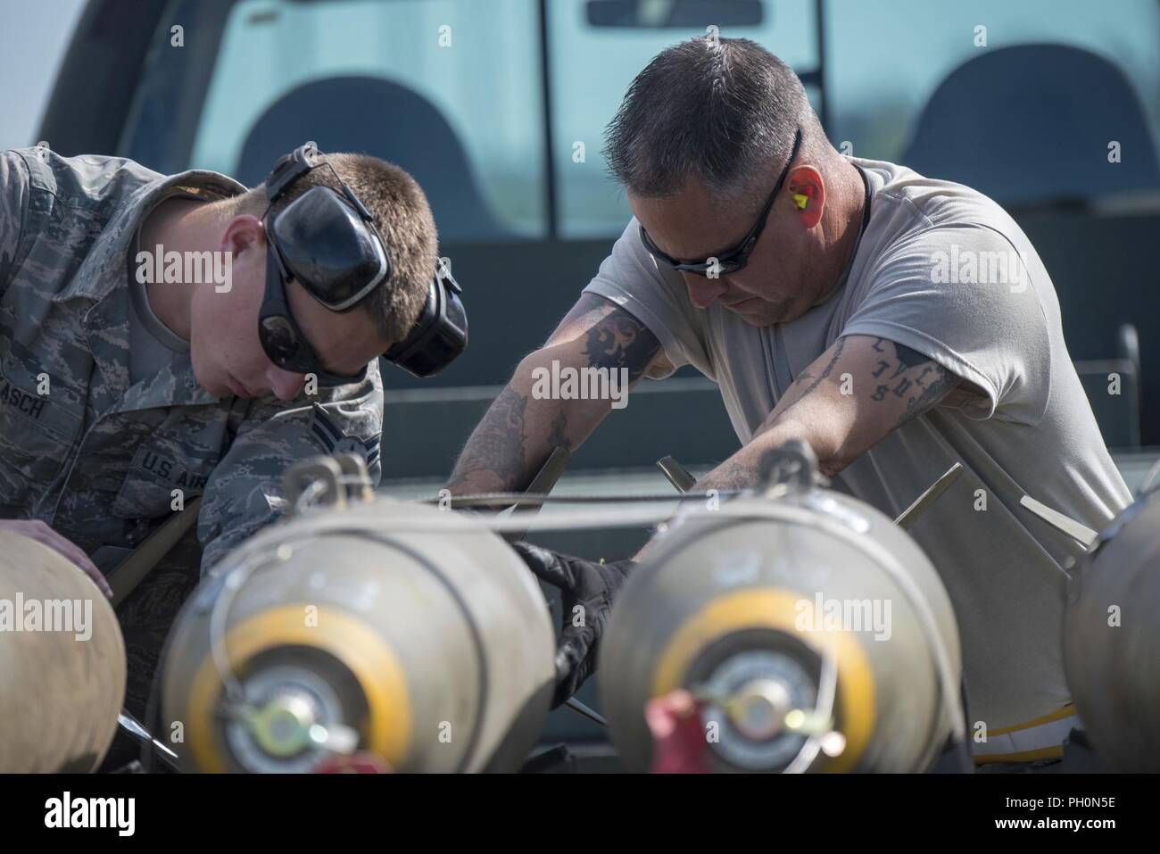 U.S. Air Force Airman 1st Class Matthew Kasch, and Tech Sgt. Peter ...