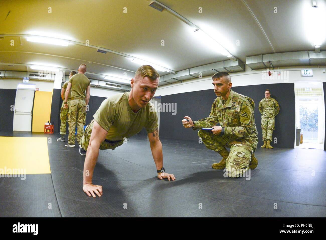 Soldiers conduct a non-standard physical fitness test during the 7th ...