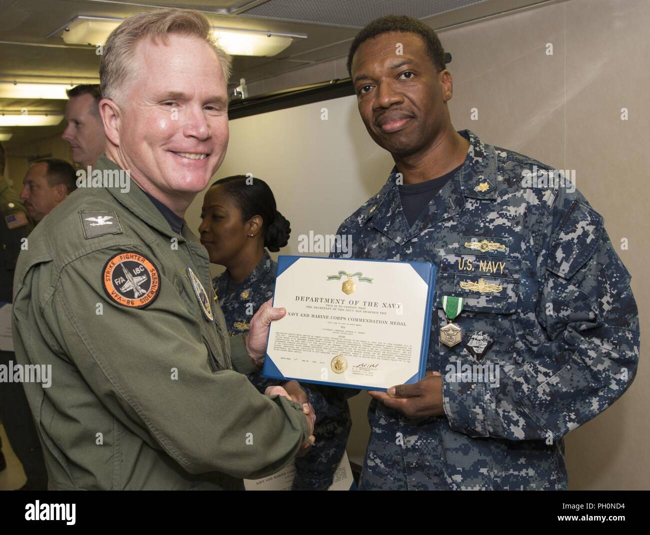 NORFOLK, Va. (June 15, 2018) -- Lt. Cmdr. Antheus Hebert (right), of ...