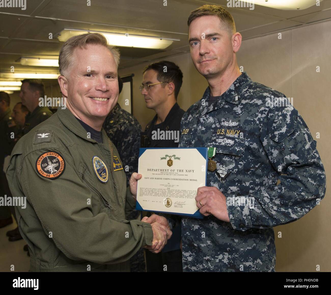 NORFOLK, Va. (June 15, 2018) -- Lt. j.g. Corey T. Jones (right), of ...
