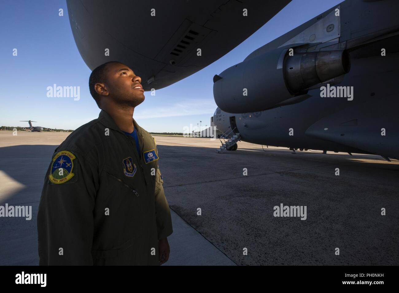 U.S. Air Force Tech. Sgt. Matthew Fisher, a C-17 Globemaster III flying ...