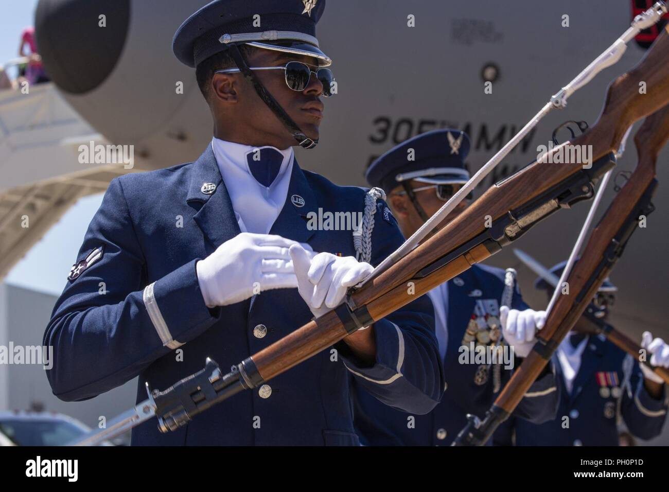 The U.S. Air Force Honor Guard Drill Team performs in front of visitors ...
