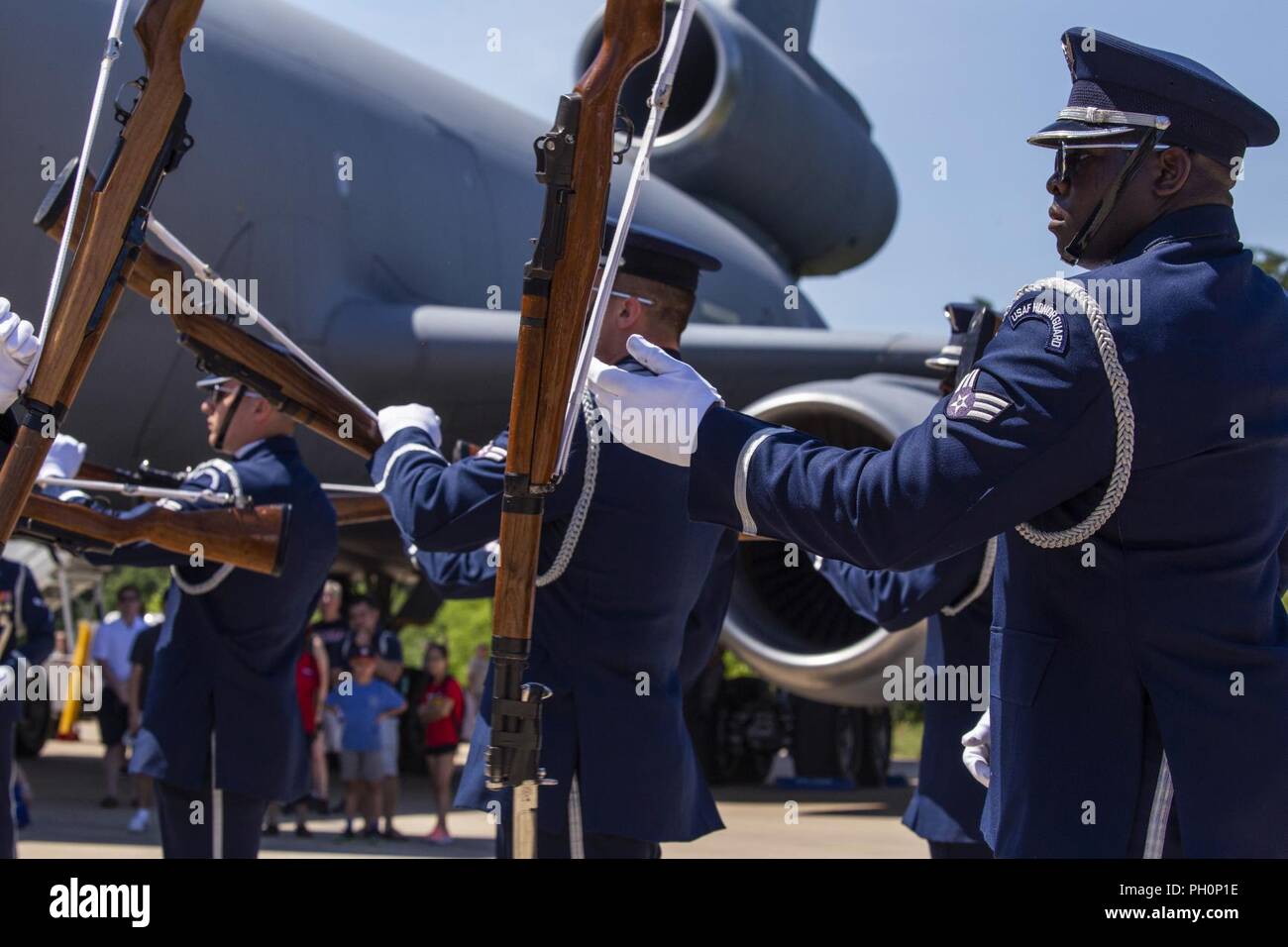The U.S. Air Force Honor Guard Drill Team performs in front of visitors ...