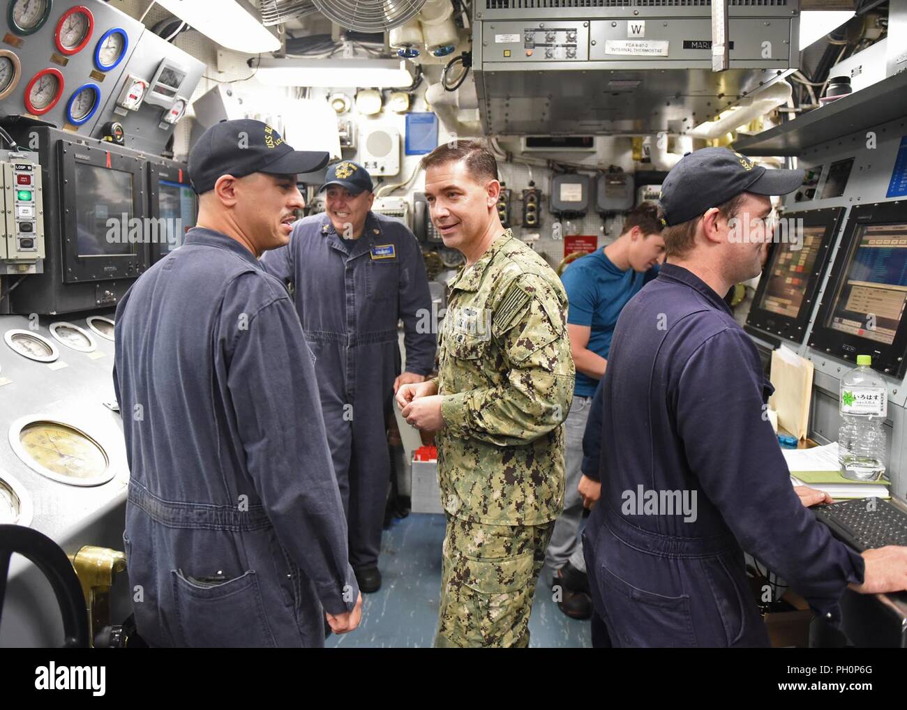 YOKOSUKA, Japan (June 19, 2018) Rear Adm. Brad Cooper, center ...