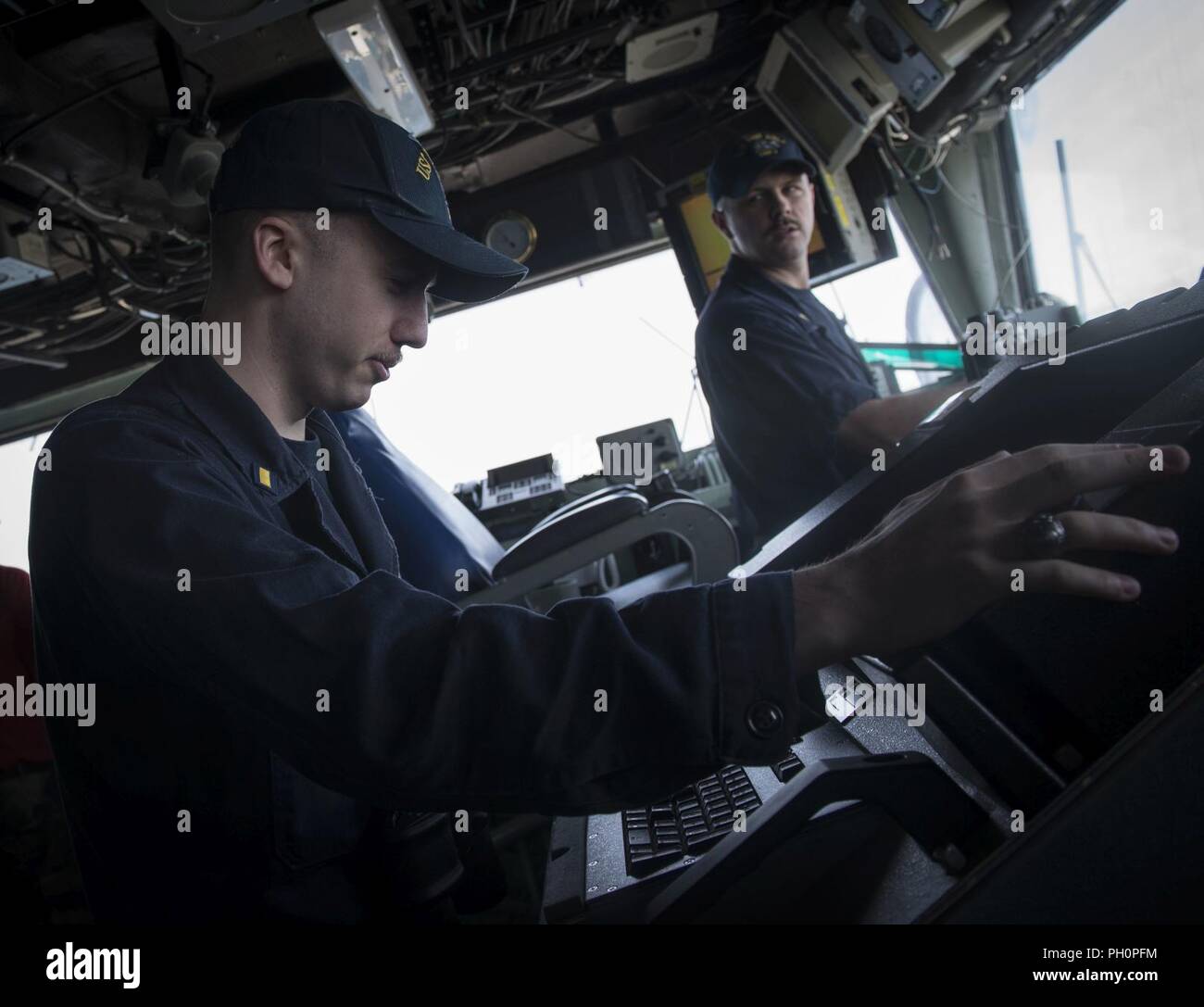 5TH FLEET AREA OF OPERATIONS (June 20, 2018) Ensign Daniel Jonas stands ...
