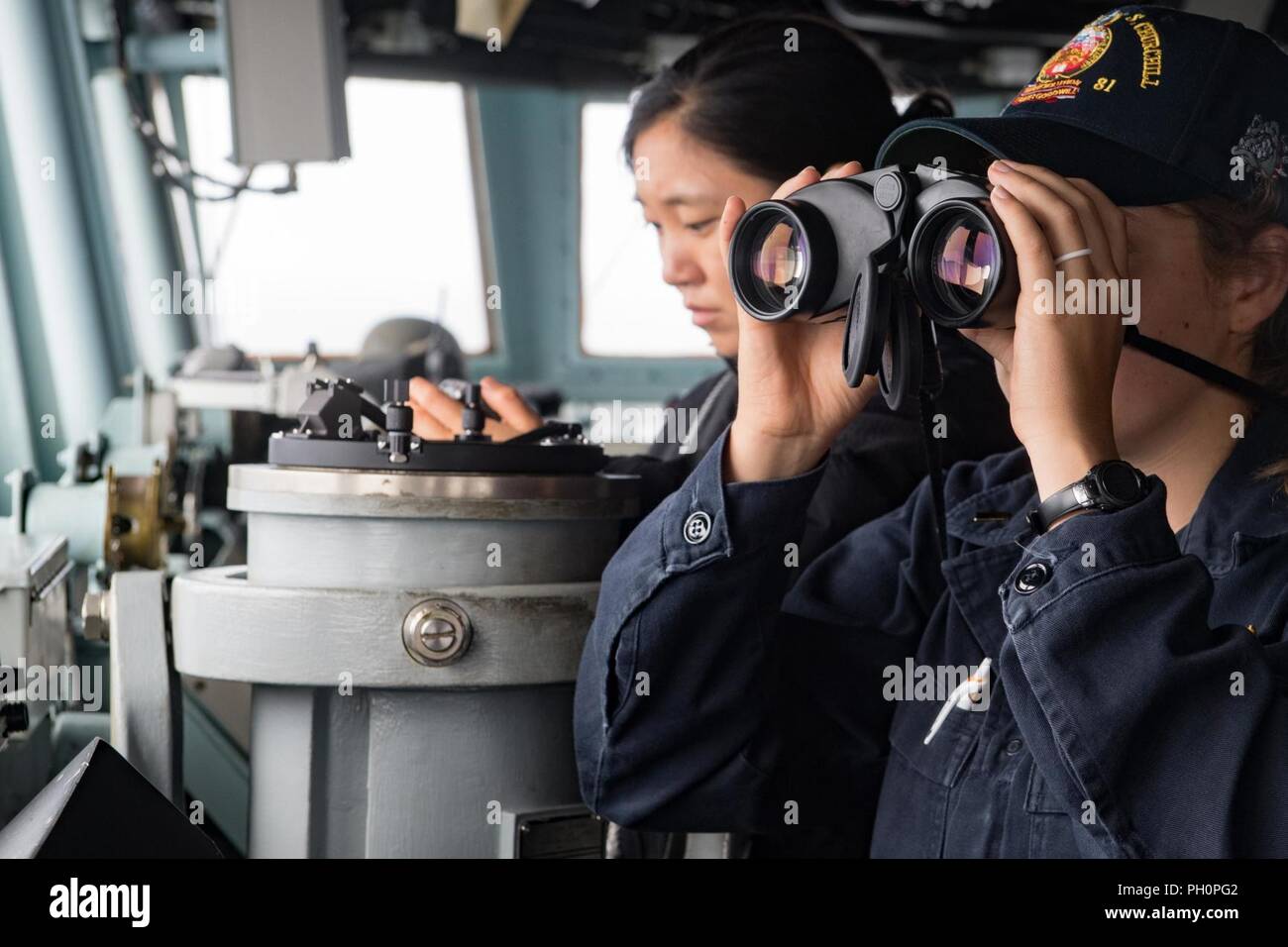 MEDITERRANEAN SEA (June 19, 2018) Ensign Sehee Kim, left, and Ensign ...