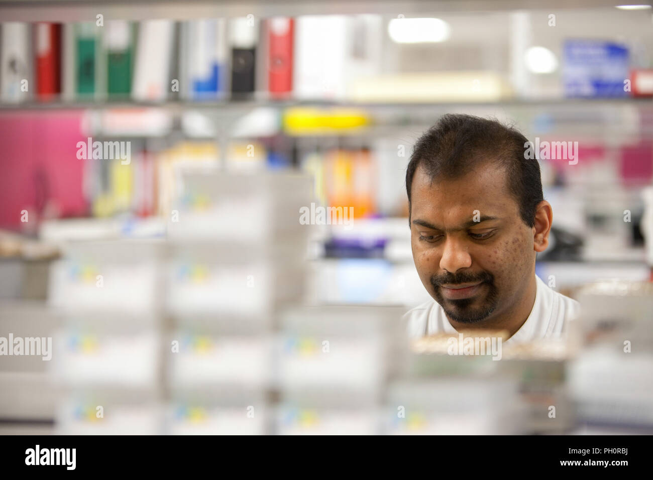 Asian Laboratory Technician working Stock Photo - Alamy