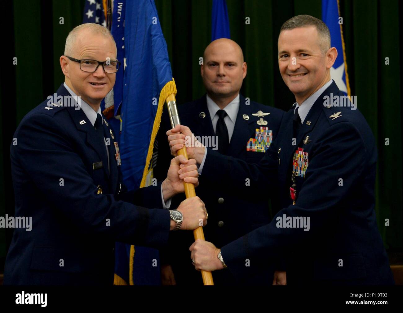 Maj. Gen. Chris Weggeman, Air Forces Cyber commander, accepts the 67th ...