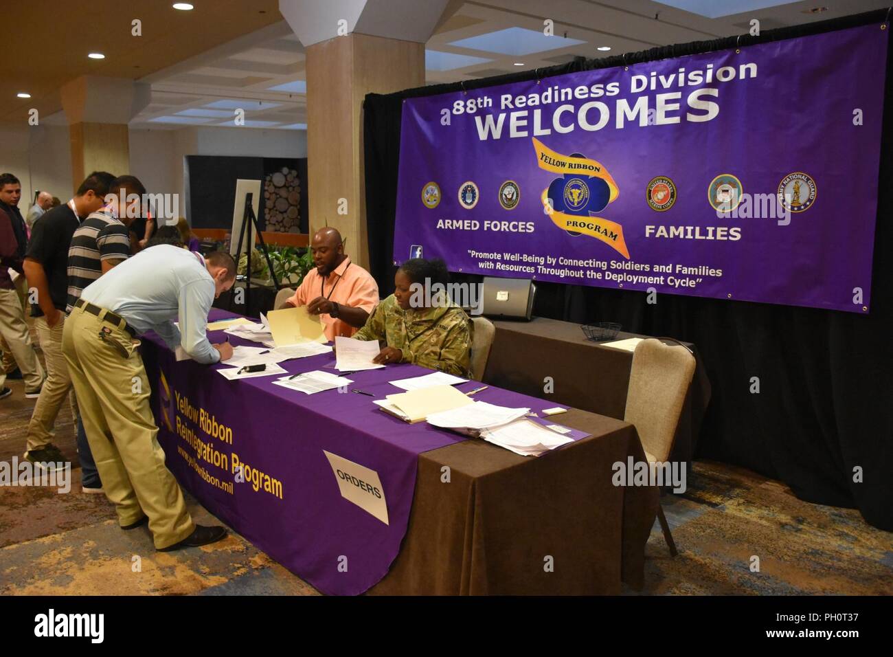 U.S. Army Reserve Soldiers and family members sign in at the ...
