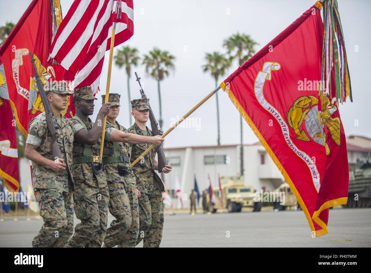 The 15th Marine Expeditionary Unit's color guard, led by the color ...