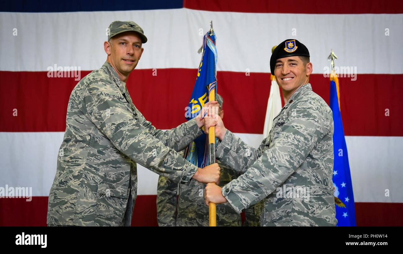 Col. Kevin Mantovani, 51st Mission Support Group commander, left ...